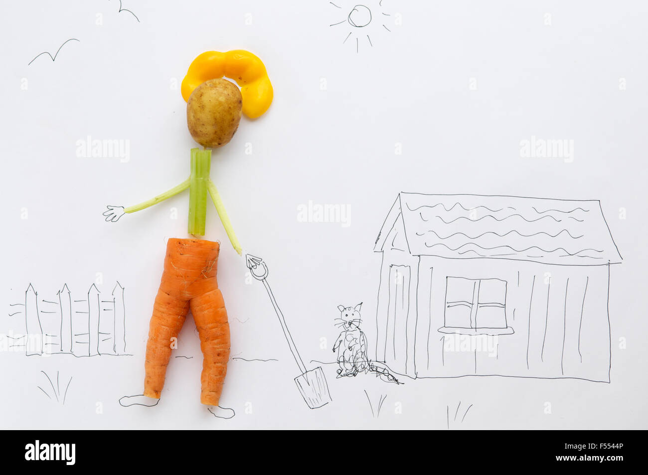Figure made from vegetables with drawing background Stock Photo - Alamy