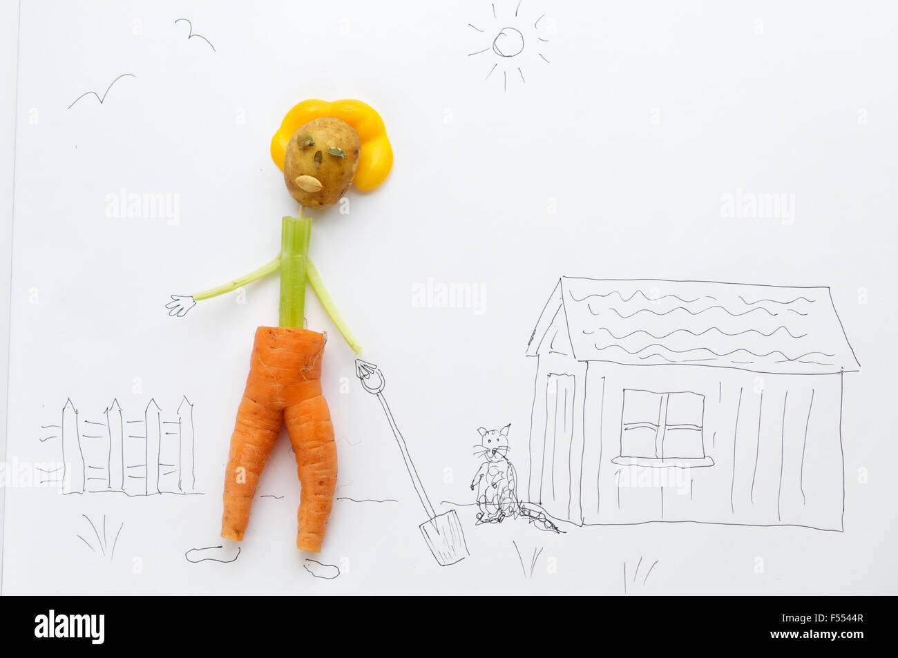 Figure made from vegetables with drawing background Stock Photo - Alamy