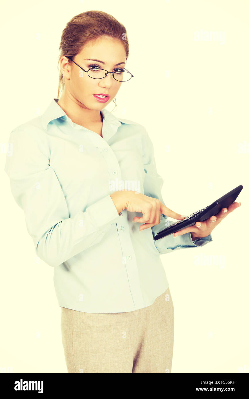 Bank employee with calculator Stock Photo - Alamy