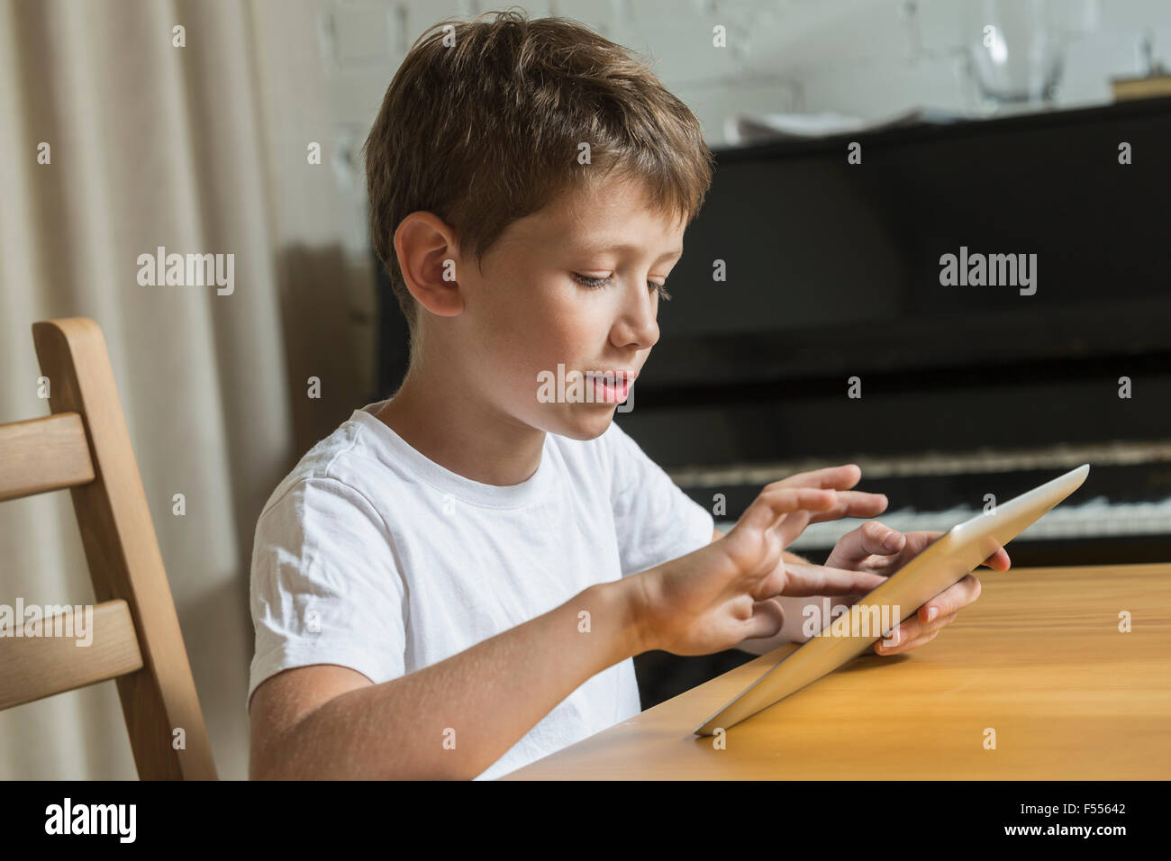 Boy using hi-res stock photography and images - Alamy