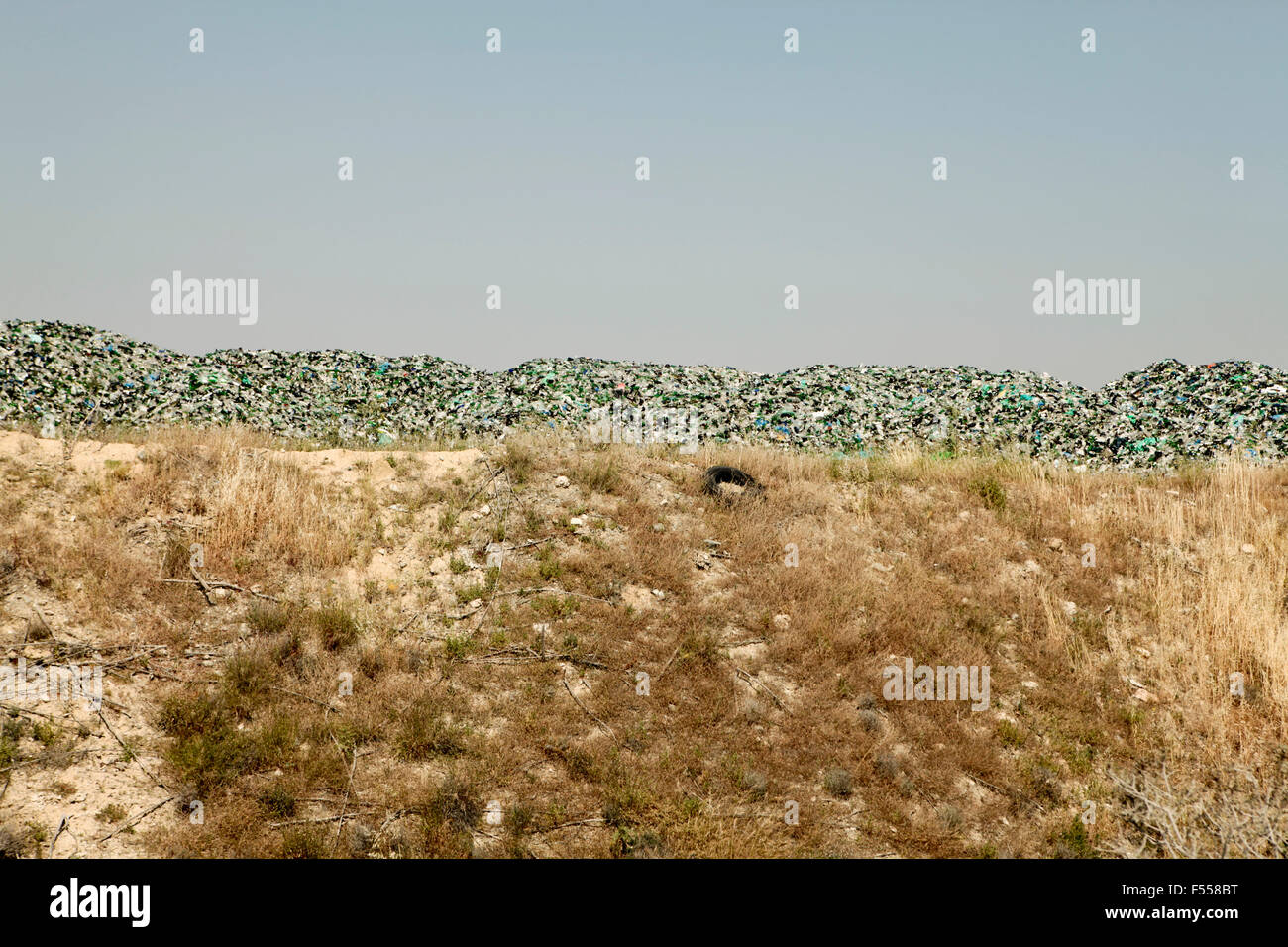 Garbage heap on field against clear sky Stock Photo - Alamy