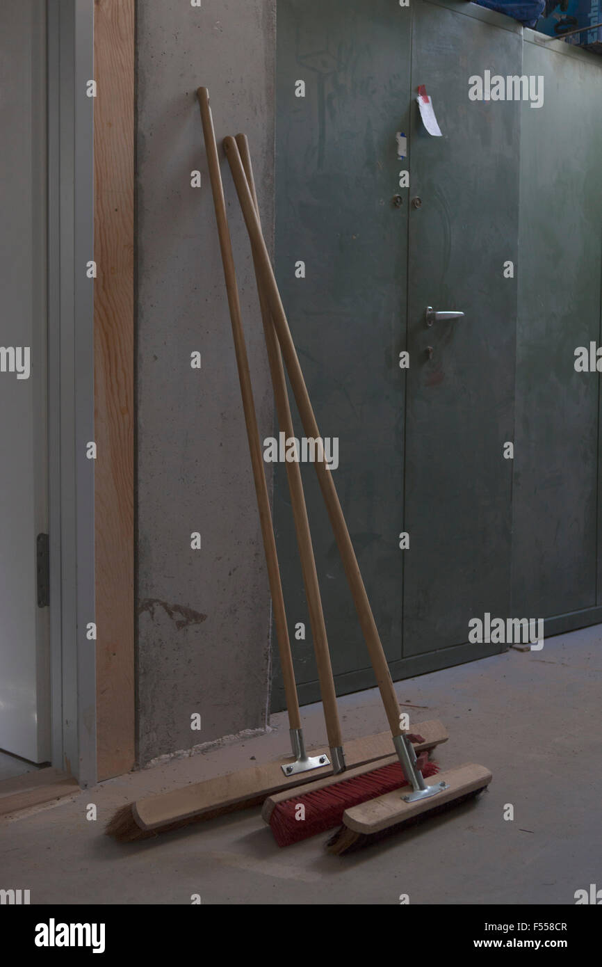 Broom leaning against wall hi-res stock photography and images - Alamy