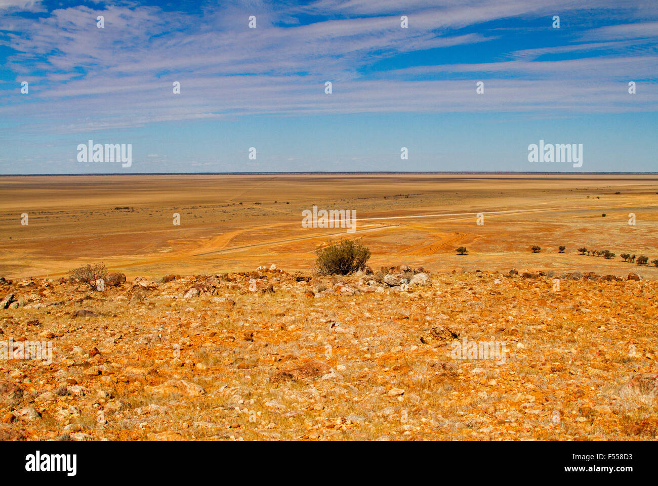 View from hilltop lookout of vast arid treeless plains of Australian ...
