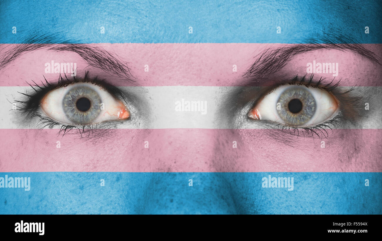 Women eye, close-up, eyes wide open, flag of Trans Pride Stock Photo ...