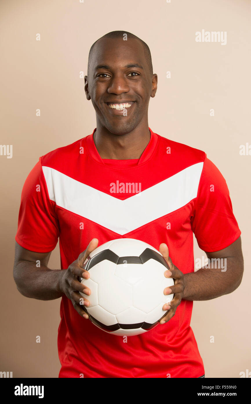 Happy soccer player hi-res stock photography and images - Alamy