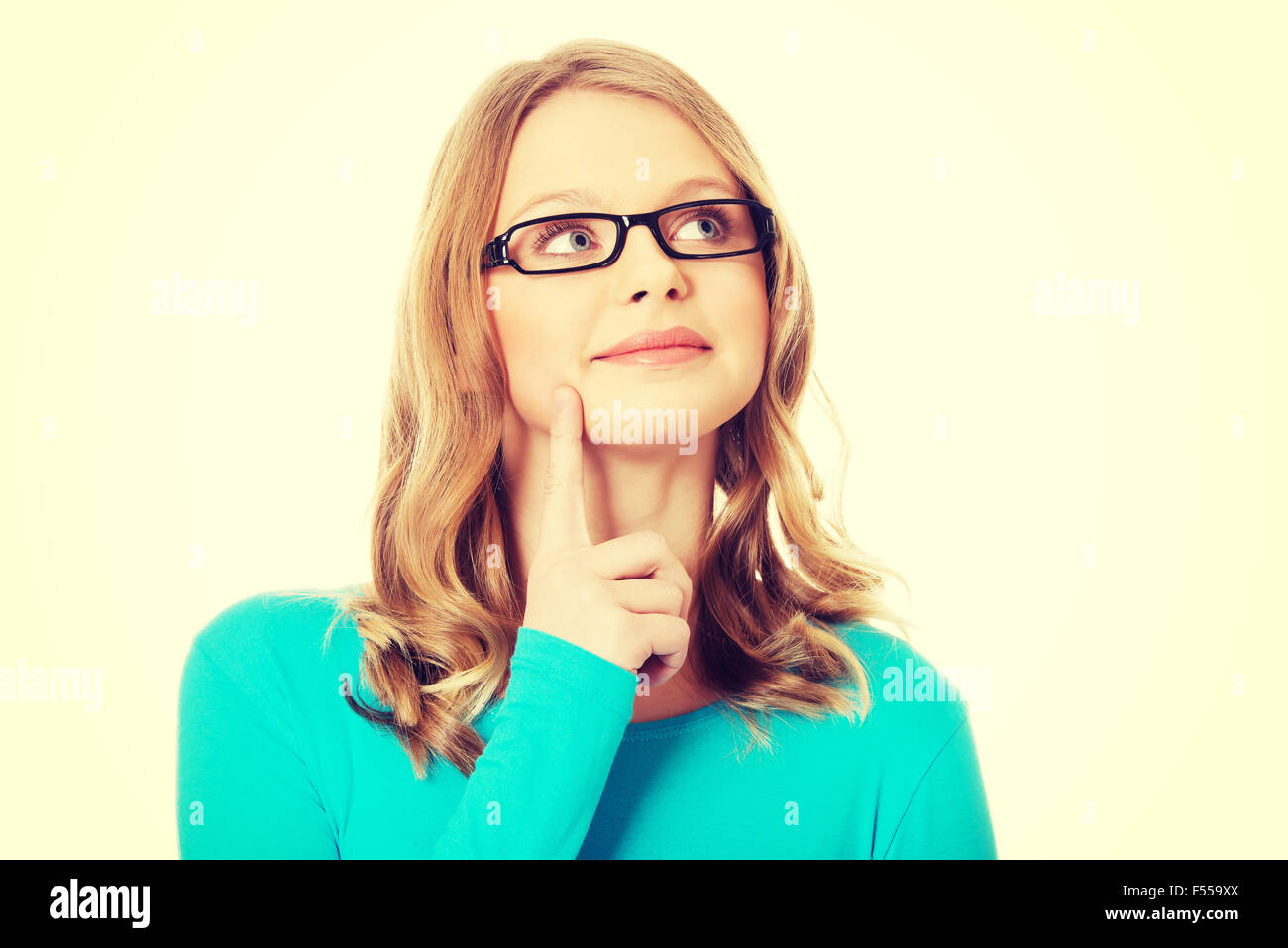 Thoughtful teenage woman looking up Stock Photo - Alamy Thoughtful teenage woman looking up Stock Photo - Alamy