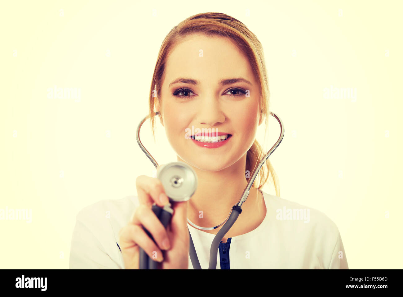 Young positive female medic hi-res stock photography and images - Alamy
