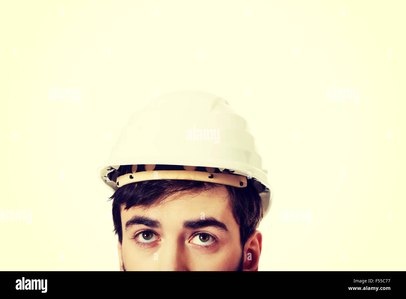Hard hat looking up hi-res stock photography and images - Alamy