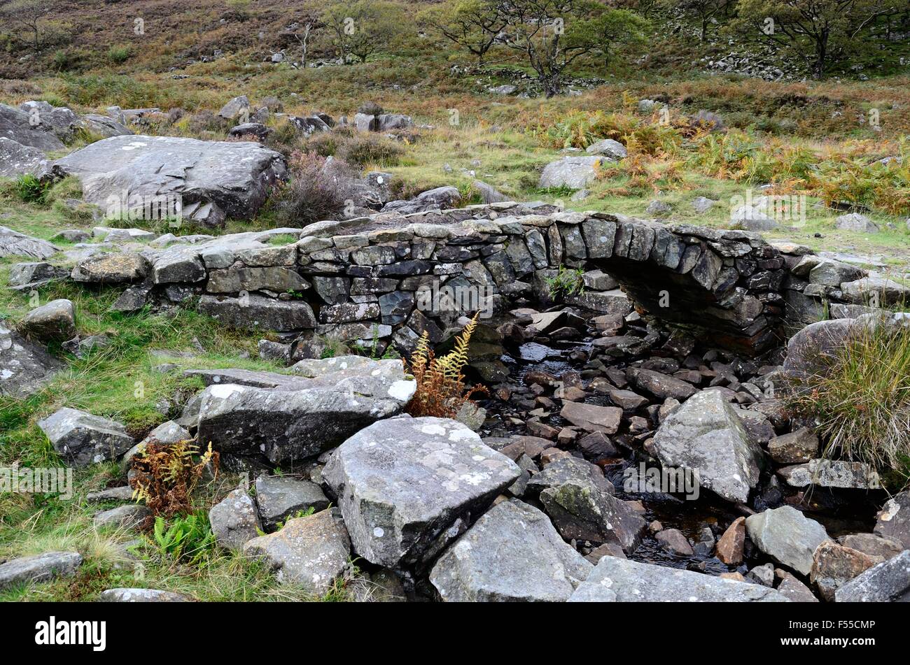 Small stone hump back bridge on the Roman Steps walk towards the ...