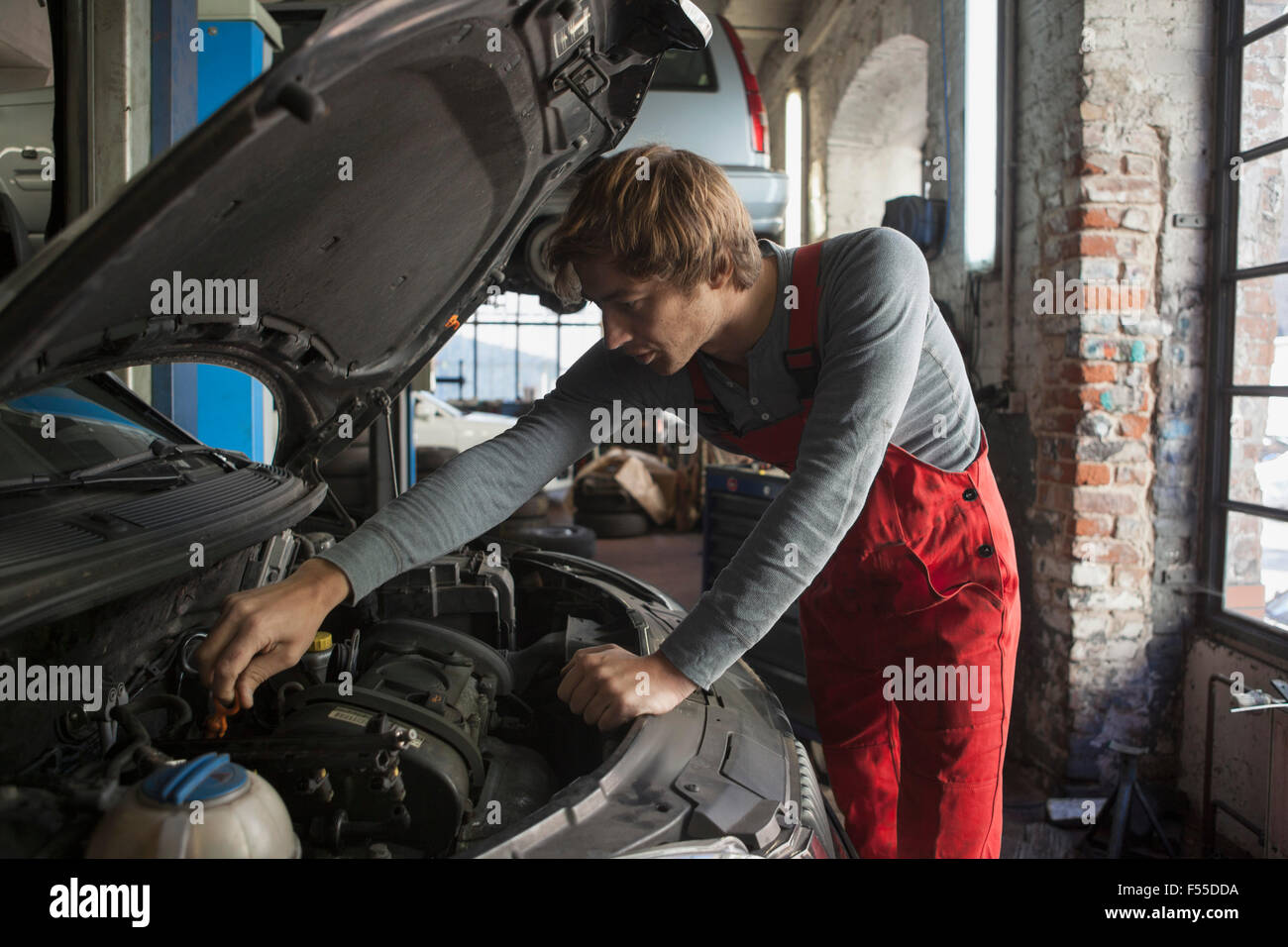 Small engine repair hi-res stock photography and images - Alamy