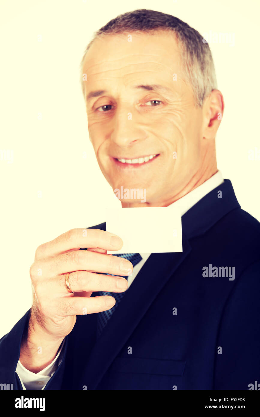 Businessman showing a blank identity name card Stock Photo - Alamy