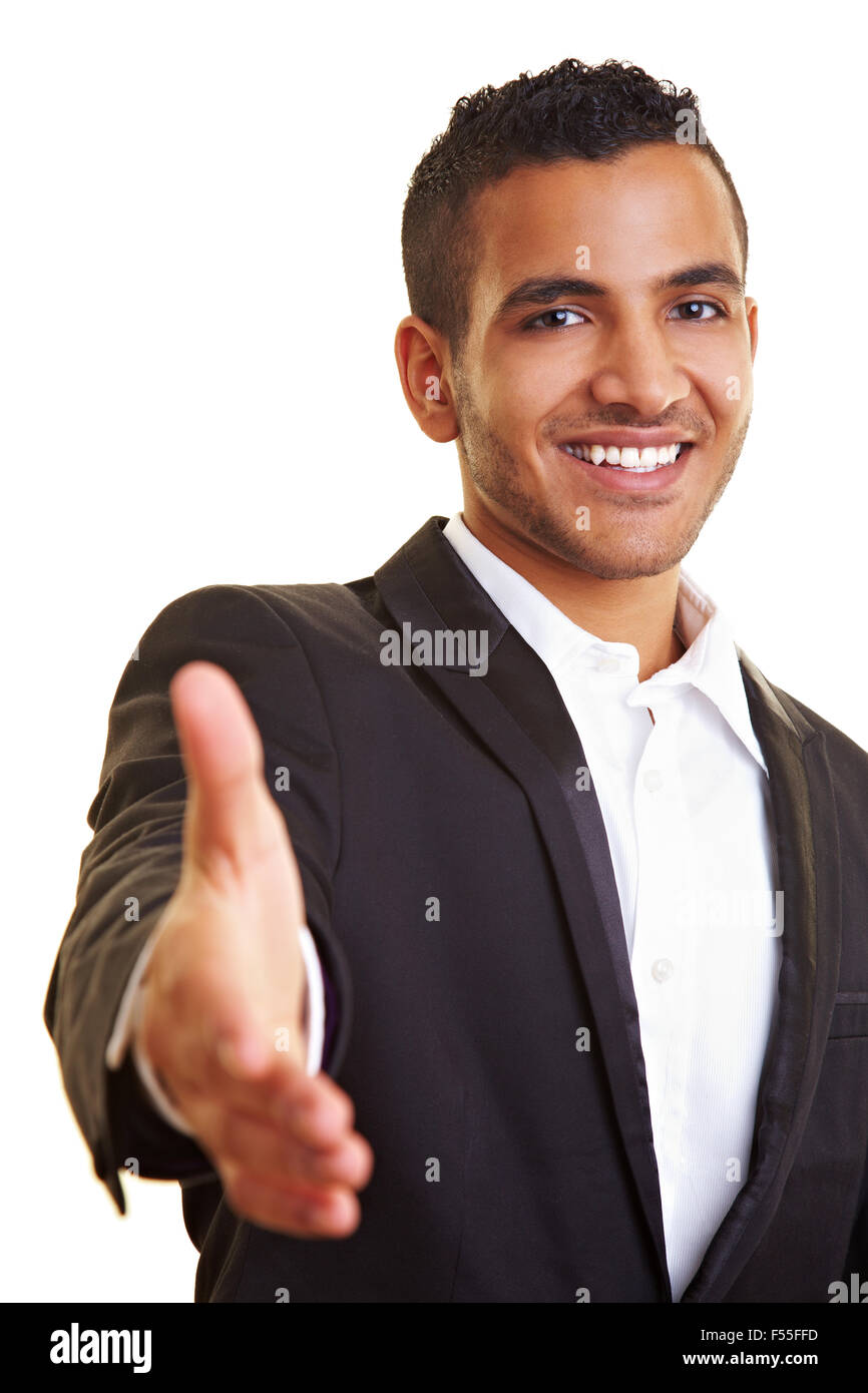 Young businessman reaching out for a handshake Stock Photo - Alamy