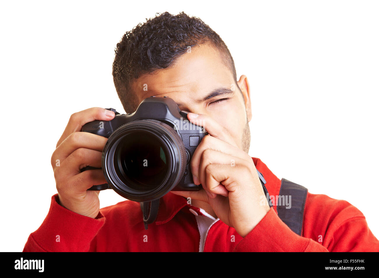 Young man looking through viewfinder of digital camera Stock Photo - Alamy