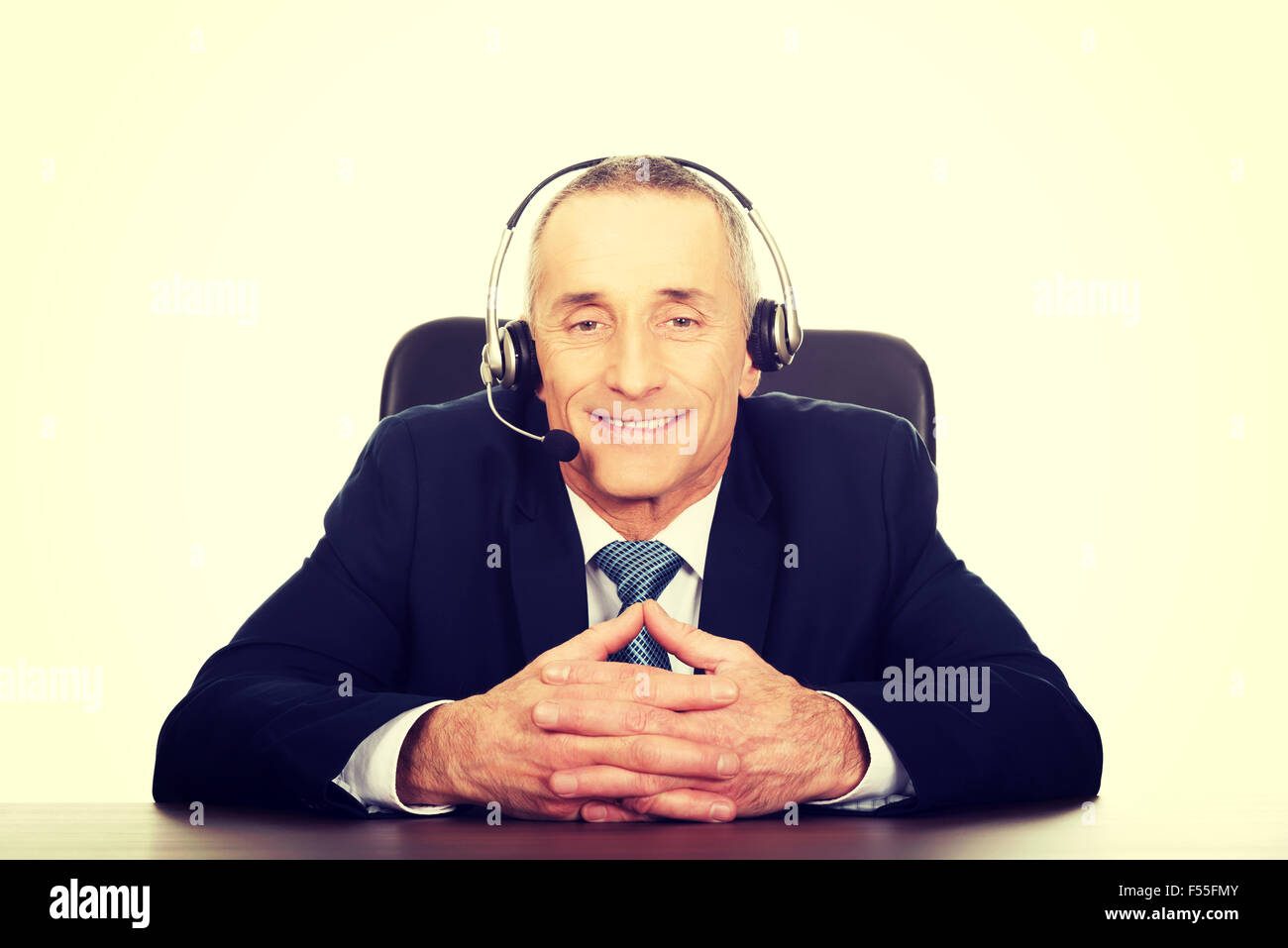 Call center man sitting in the office Stock Photo - Alamy