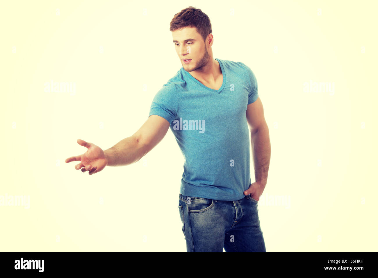 Young casual man aiming hi-res stock photography and images - Alamy