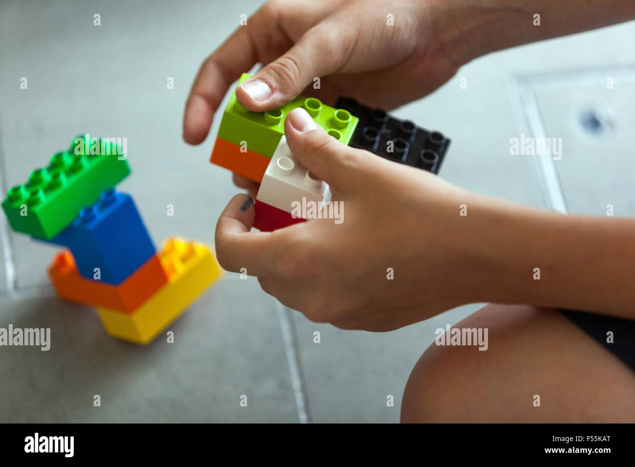Child playing with lego hi-res stock photography and images - Alamy