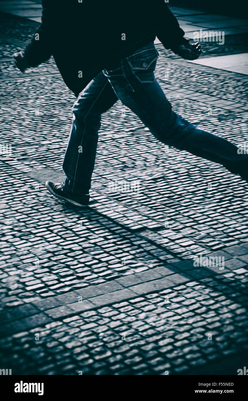 Man running street hi-res stock photography and images - Alamy