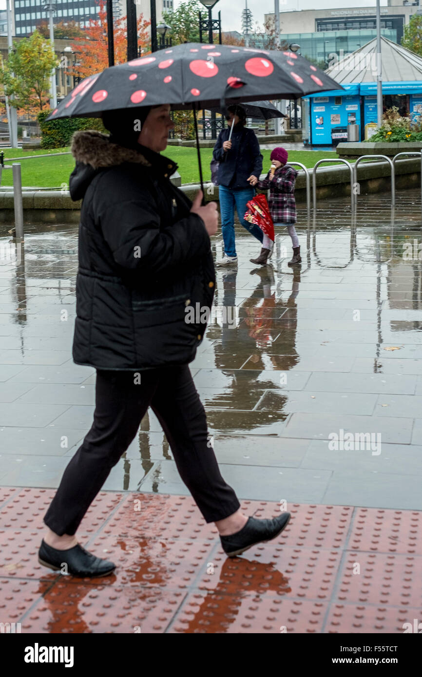Rain wet weather raincoats hi-res stock photography and images - Alamy