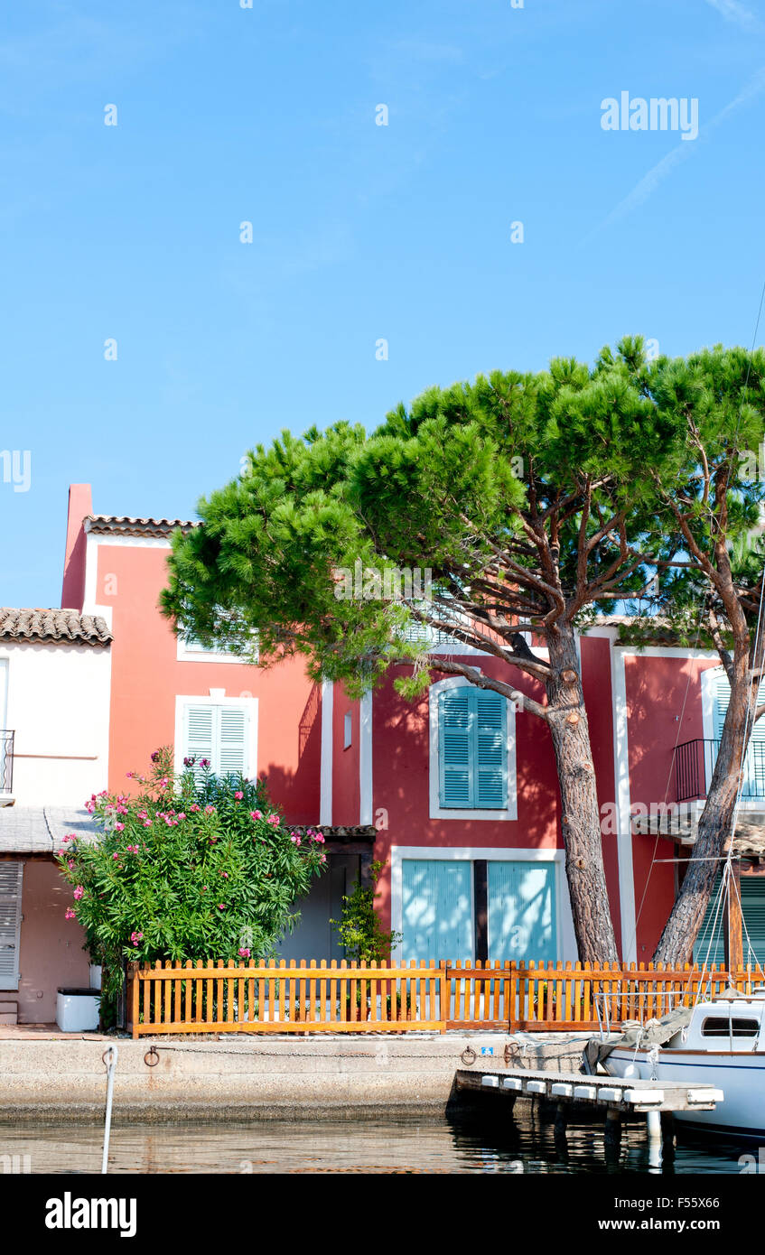 Waterfront buildings and yachts in Port Grimaud, French Riviera, France ...