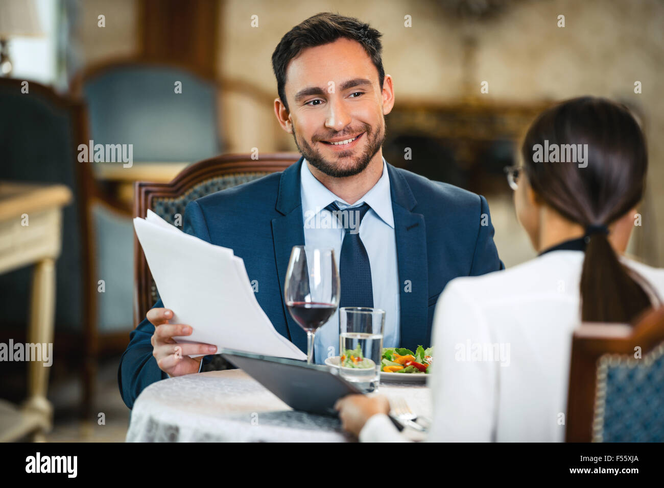 Concept for business meeting while dinner Stock Photo - Alamy