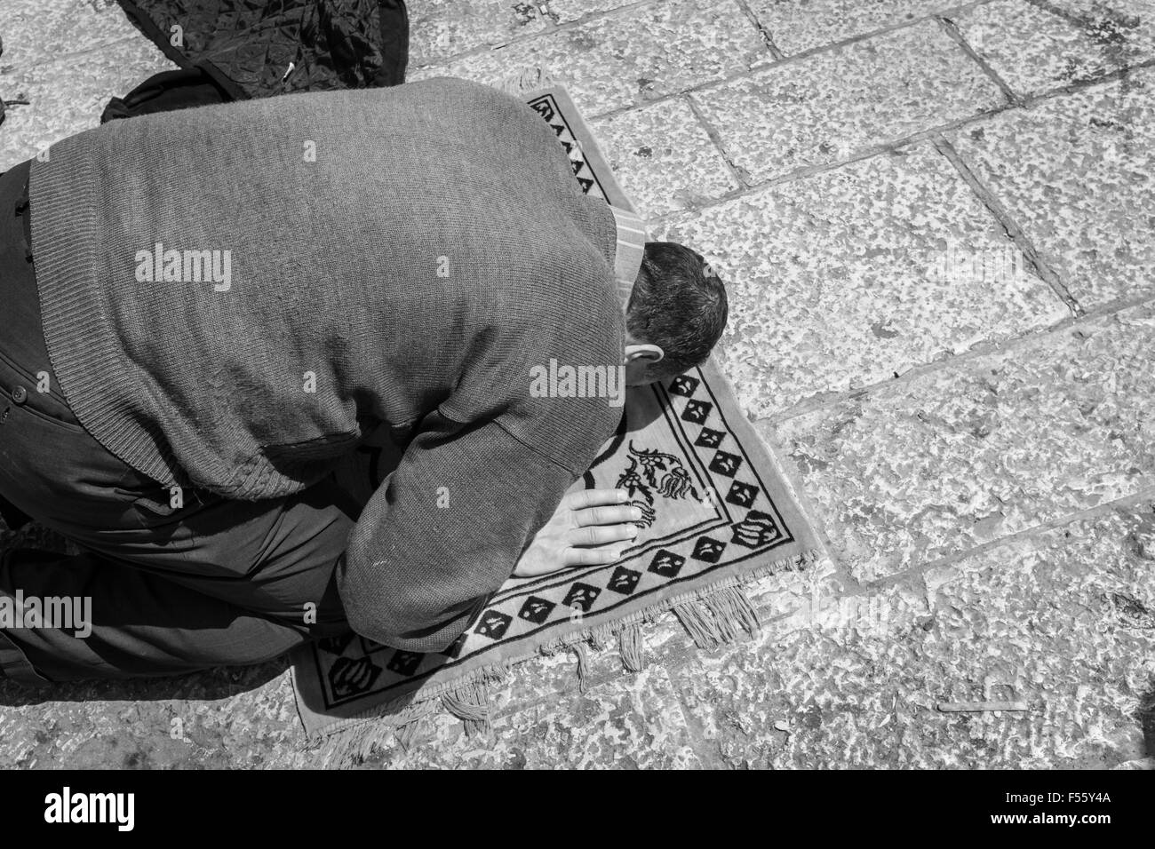 Man Praying outside, Bethlehem Stock Photo - Alamy
