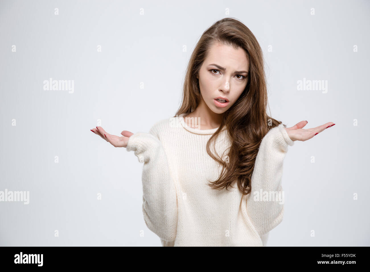 Woman shrugging shoulders hi-res stock photography and images - Alamy