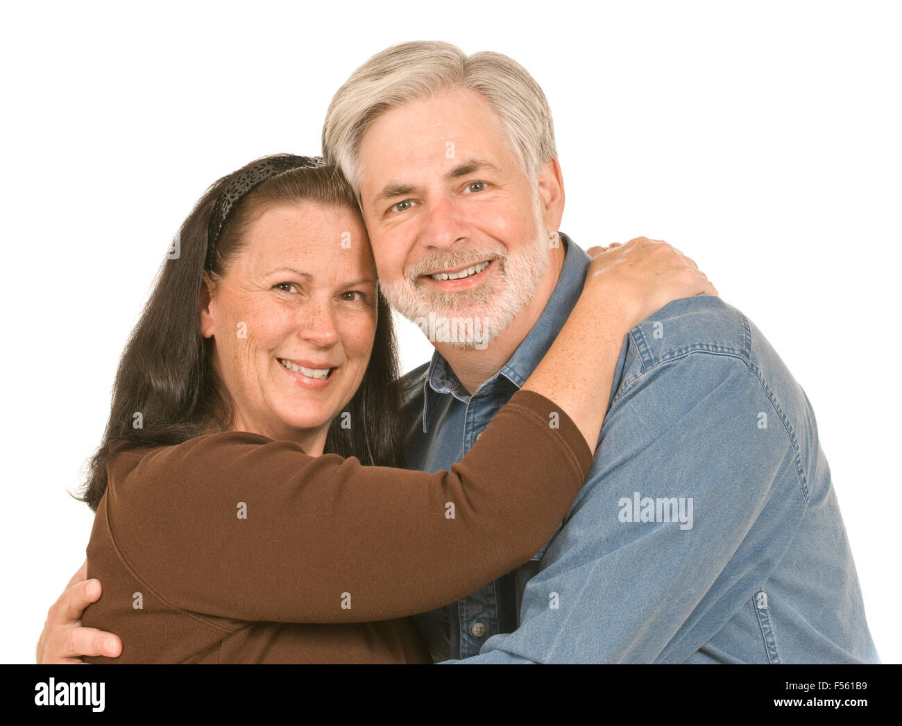 Middle-aged Couple in an Embrace Smiling Stock Photo - Alamy