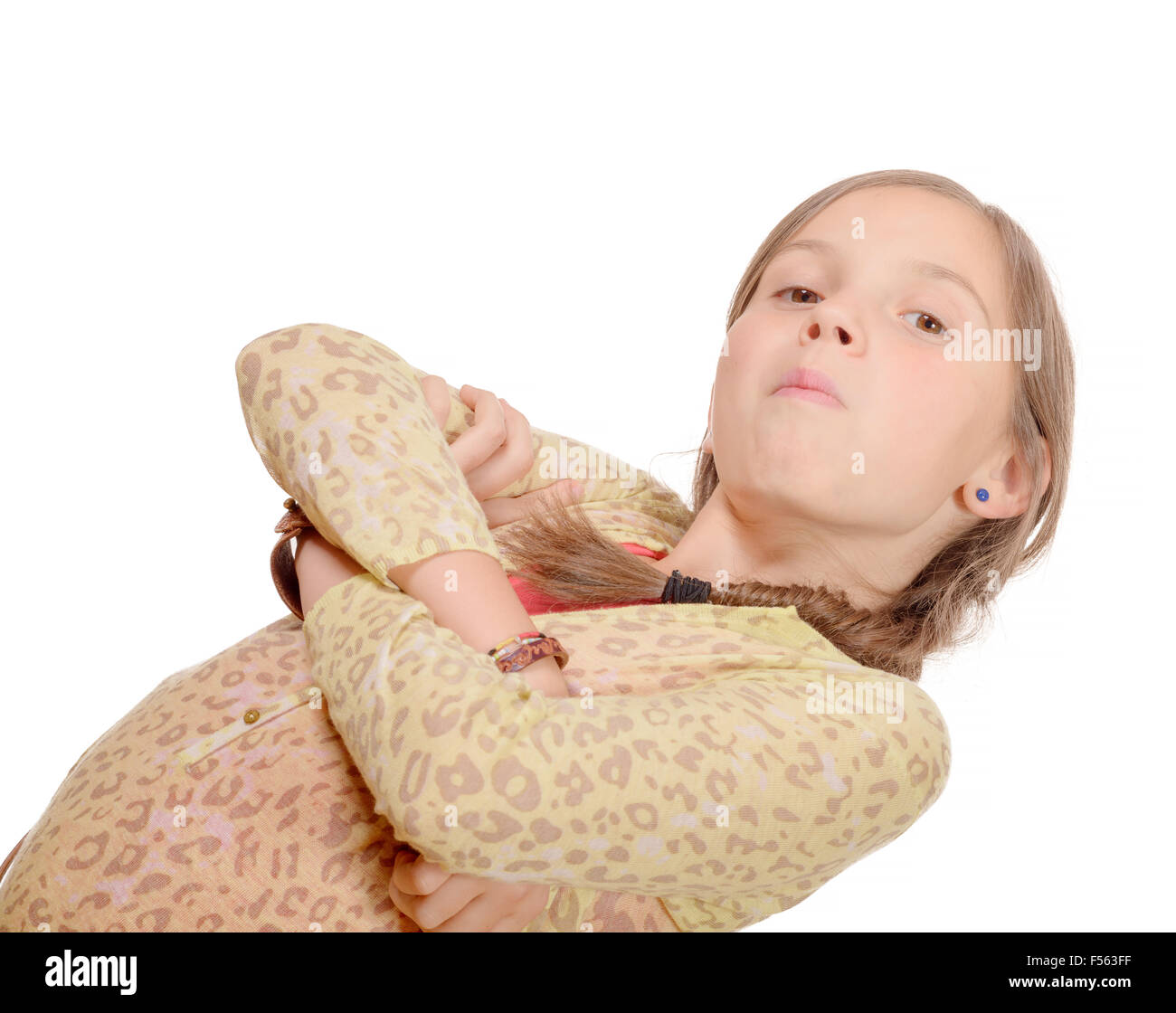 Portrait of a proud little girl, isolated on white background Stock Photo - Alamy
