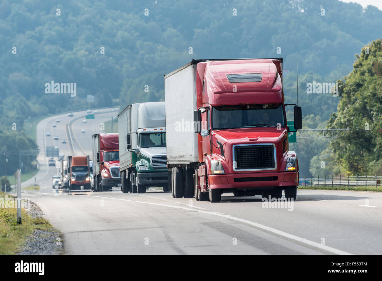 Semi-Trucks On The Highway Stock Photo - Alamy