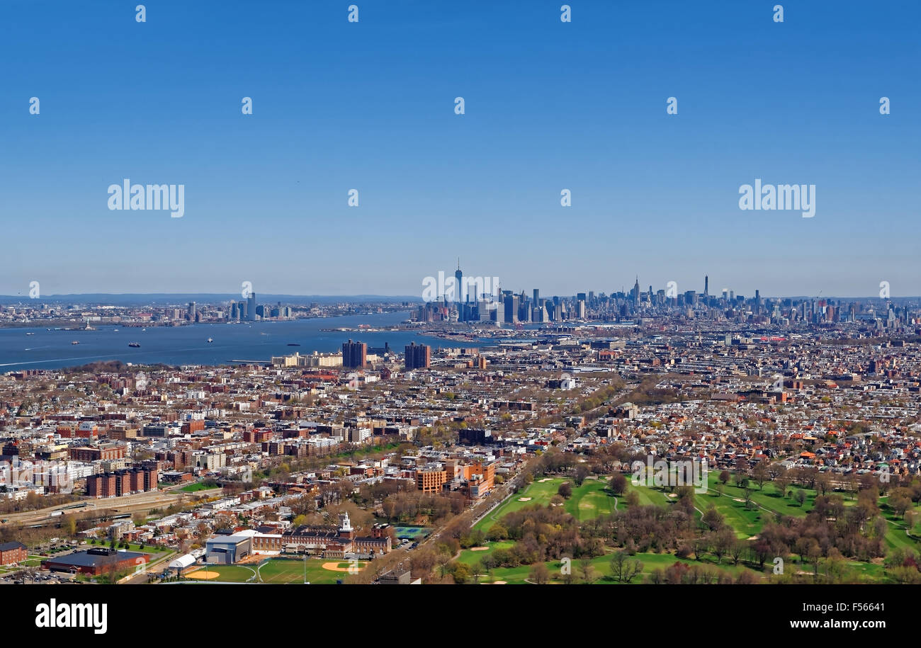 Aerial view of Brooklyn with Manhattan skyscrapers in the background ...