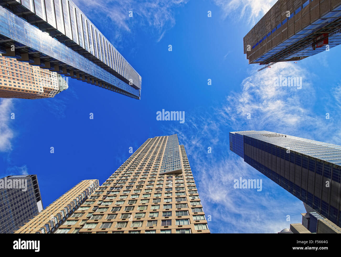 Bottom up view of New York City skyscrapers with clear blue sky, USA ...