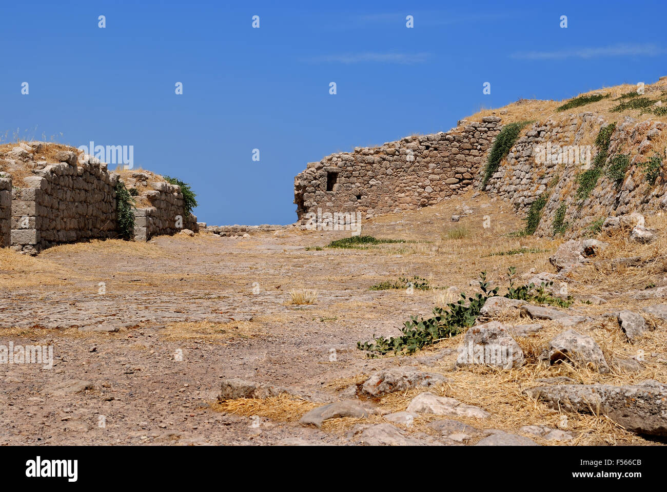 The ancient town Corinth surrounded by the ruins of the fortress wall ...