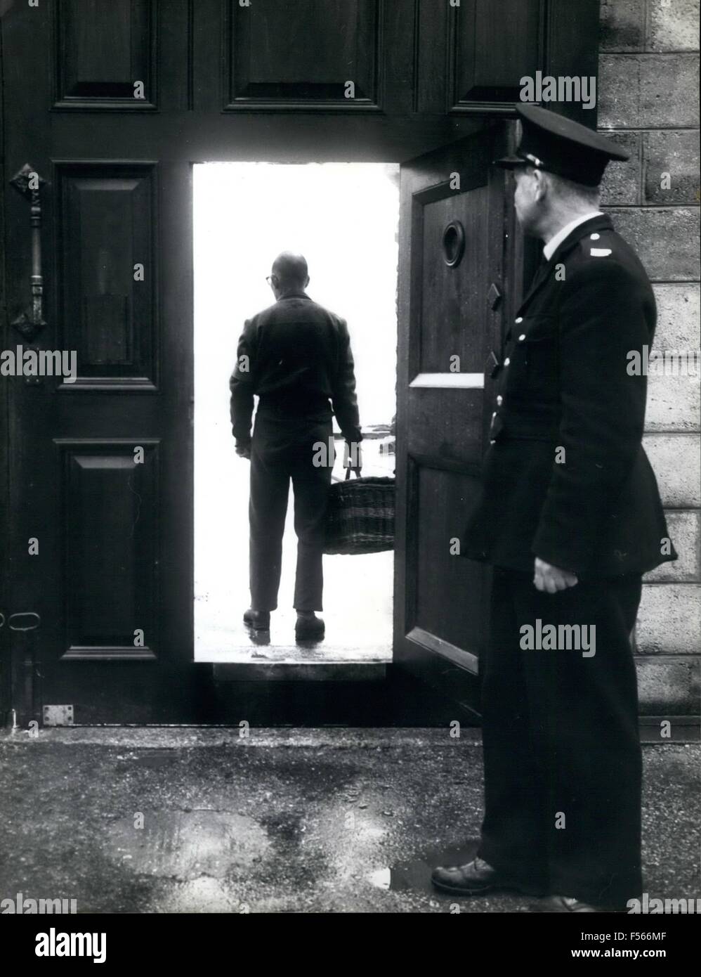 1968 - Watched by the prison officer, the prisoner takes away his ...