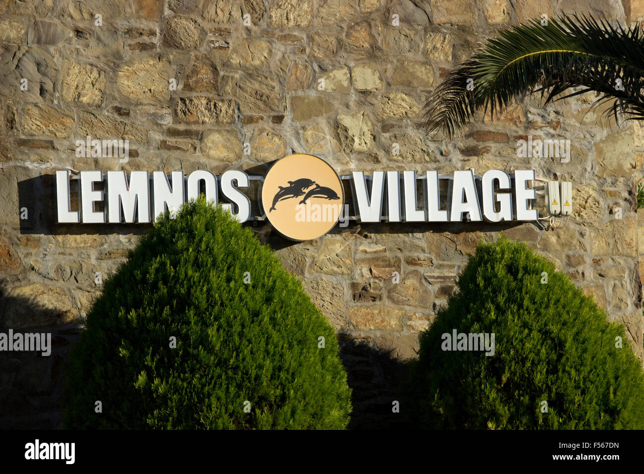 Logo and signage of 'Lemnos village' tourist resort hotel in Platy bay ...