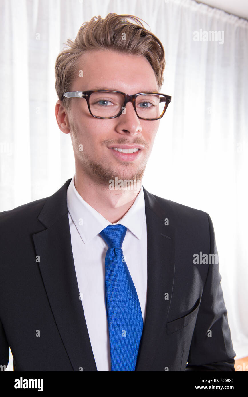 smart young business man in suit and tie Stock Photo - Alamy
