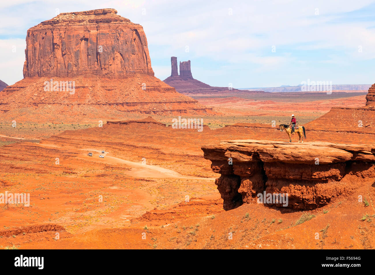 Cowboy on his horse at John Ford point in Monument Valley Navajo Tribal ...