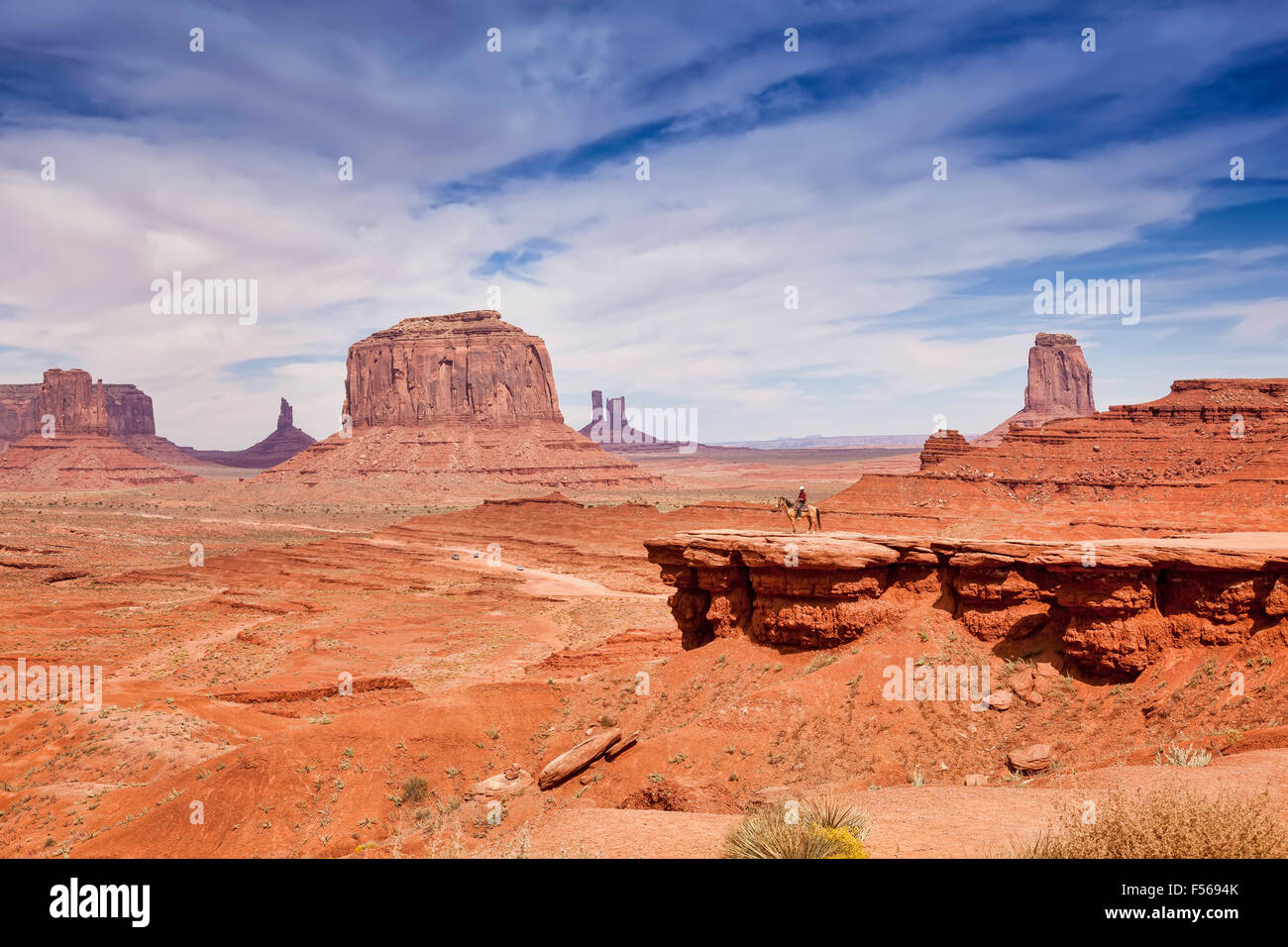 Cowboy on his horse at John Ford point in Monument Valley Navajo Tribal ...