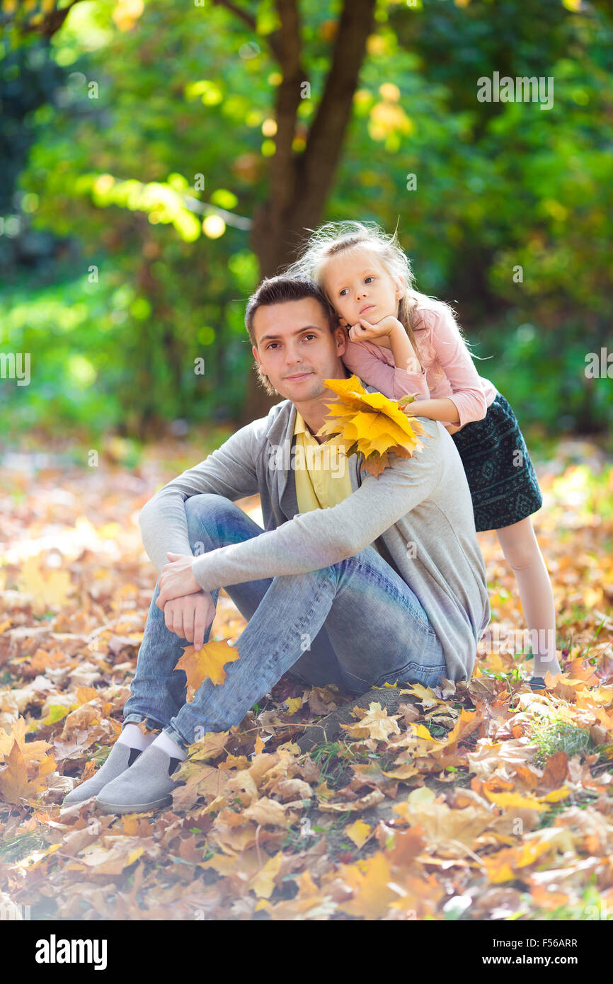 Happy family having fun on beautiful autumn day Stock Photo - Alamy