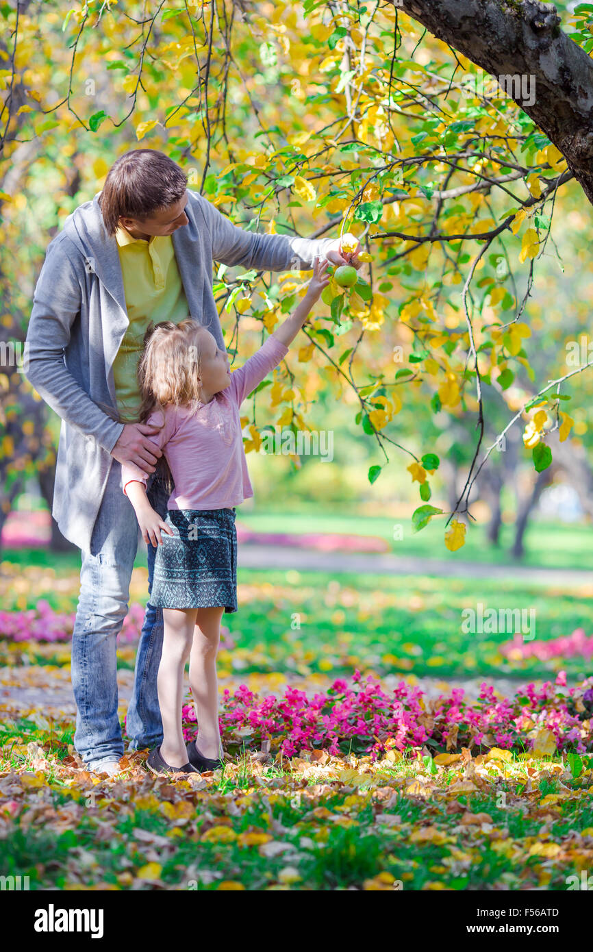 Happy family having fun on beautiful autumn day Stock Photo - Alamy