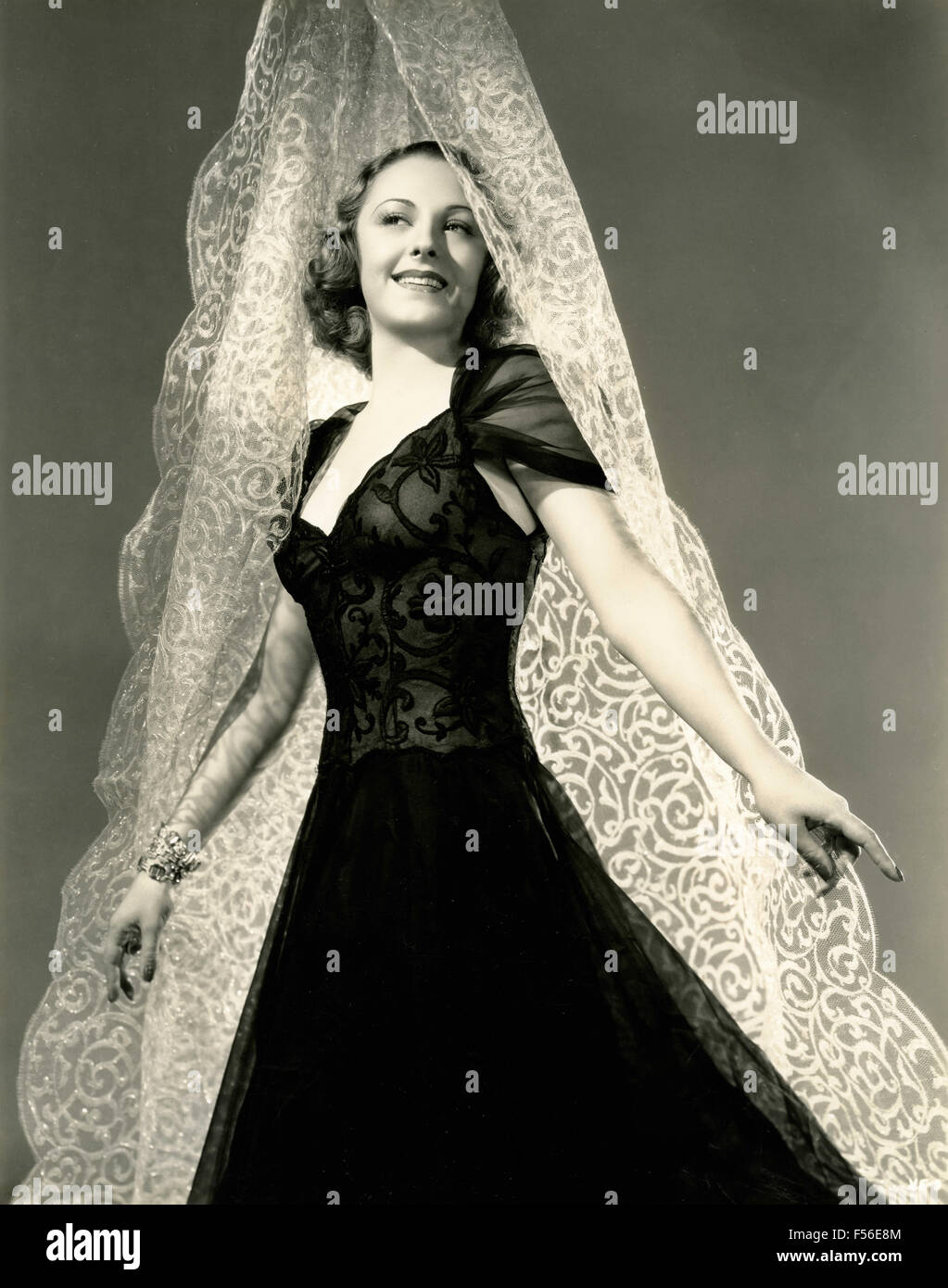 American actress Virginia Field wearing a black elegant dress Stock ...