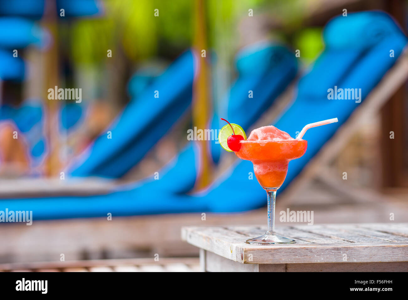Tasty alcoholic cocktail background swimming pool Stock Photo - Alamy