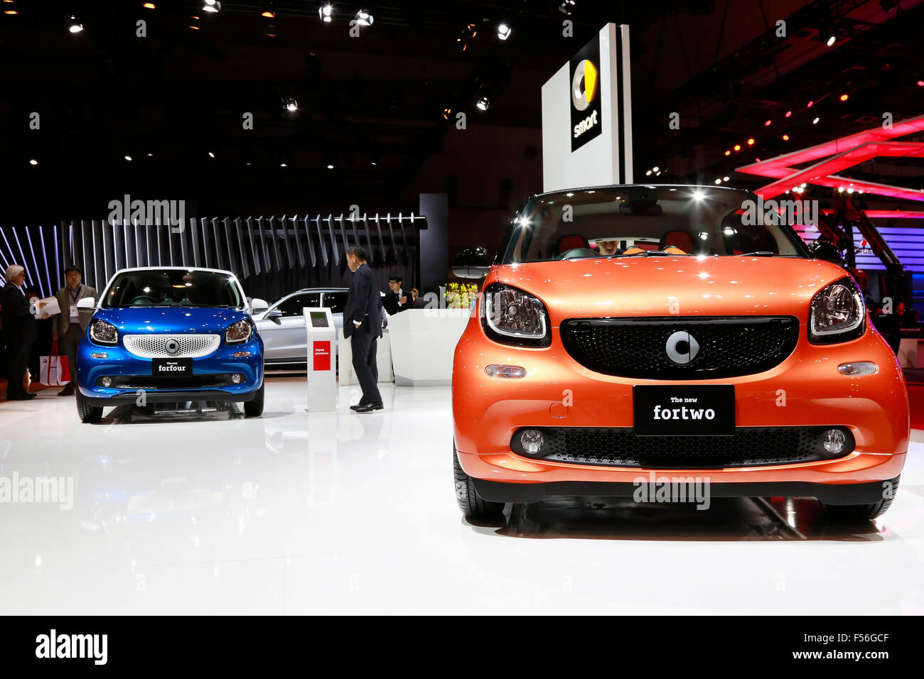 (L to R) The new smart forfour and smart fortwo cars on display during ...