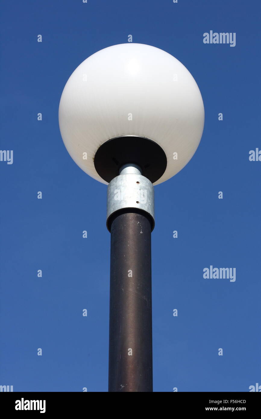 a street lamp with a large, spherical glass body Stock Photo - Alamy