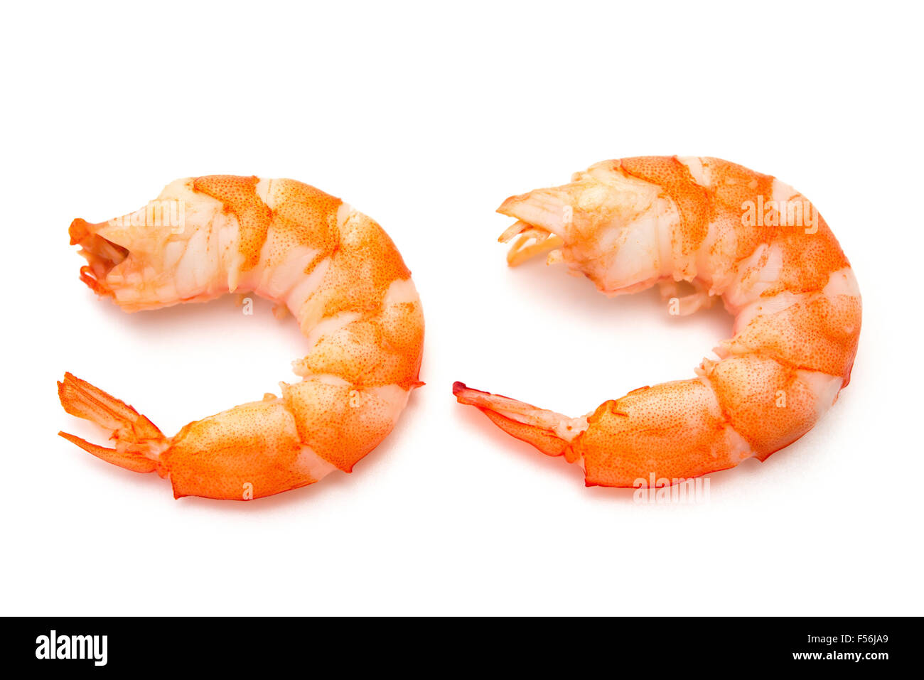 two unskin shrimps on a white background Stock Photo - Alamy