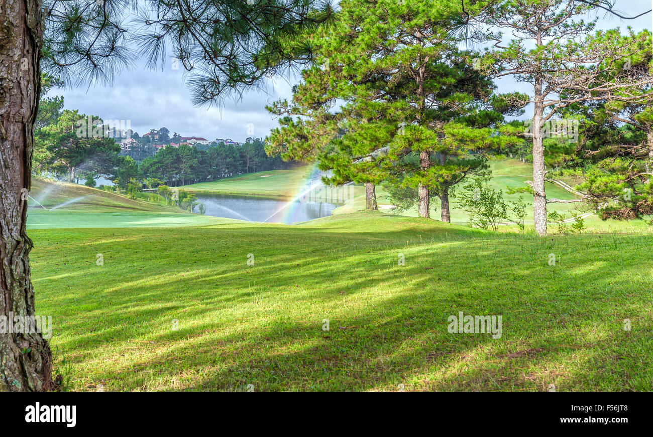 Rainbow in golf Stock Photo - Alamy