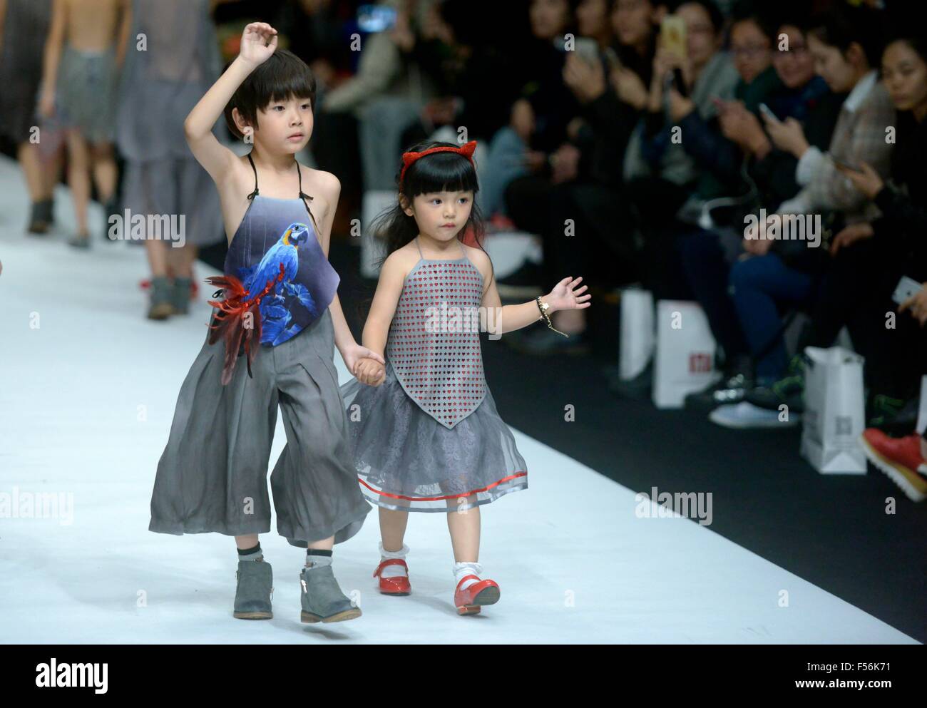 Beijing, China. 28th Oct, 2015. Child models present creations at the ...