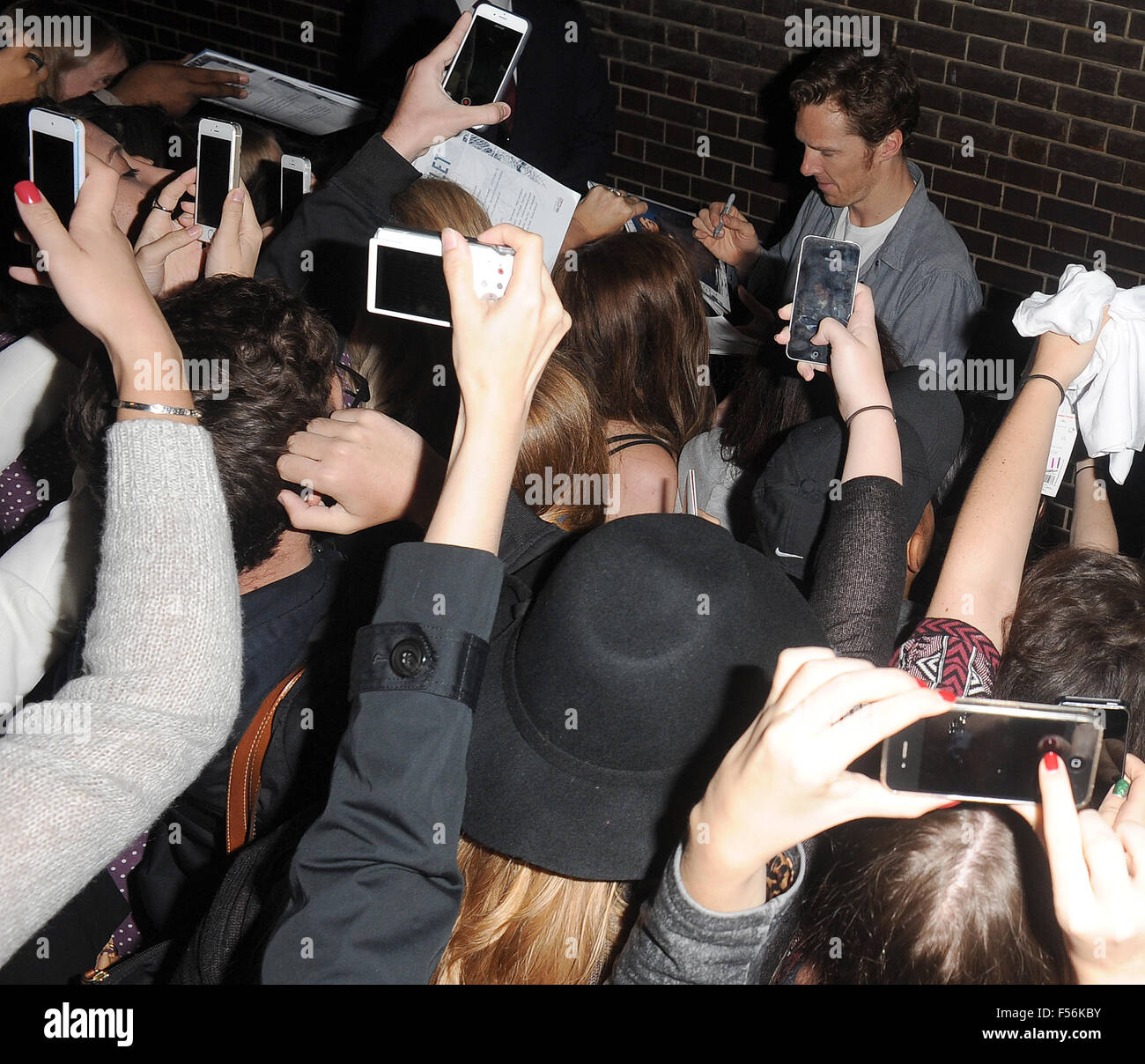 Benedict Cumberbatch is greeted by a huge mob of screaming fans, as he ...