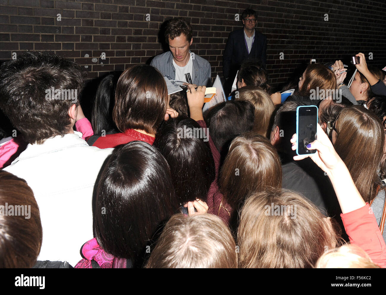 Benedict Cumberbatch is greeted by a huge mob of screaming fans, as he ...