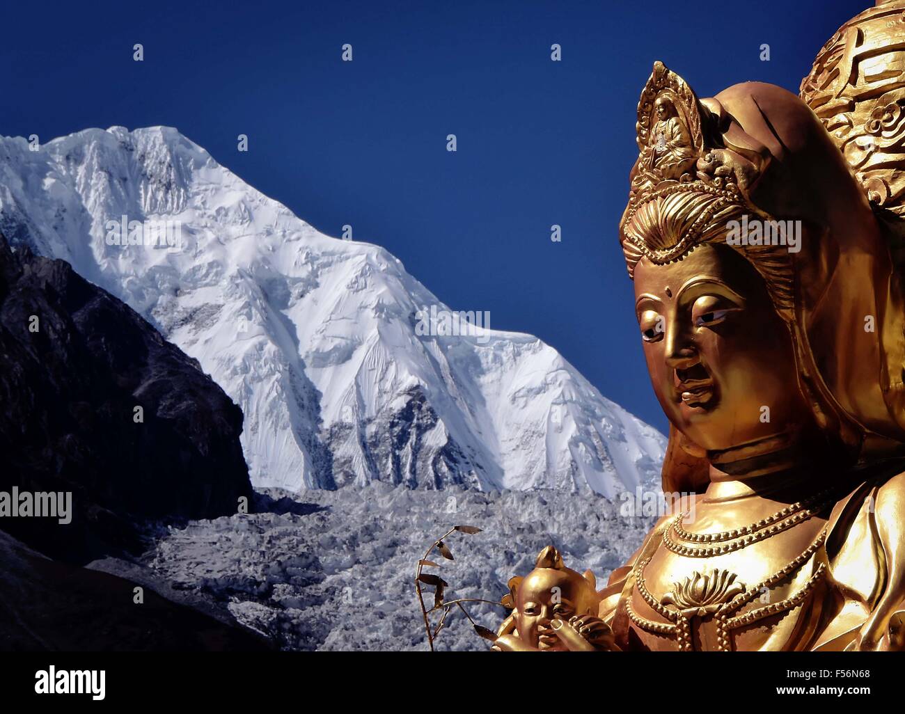 Kangding. 28th Oct, 2015. A buddhism statue is seen with Gonggar ...