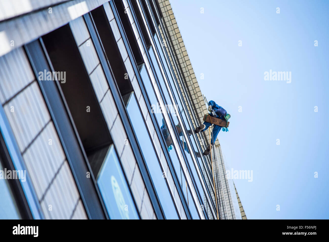 Worker cleaning building,Minato-Ku,Tokyo,Japan Stock Photo - Alamy